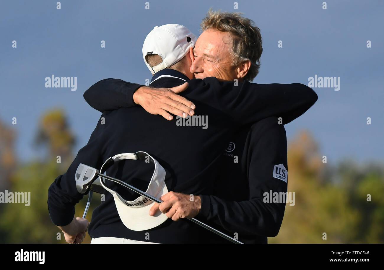 Orlando, United States. 17th Dec, 2023. Bernhard Langer (R) embraces ...