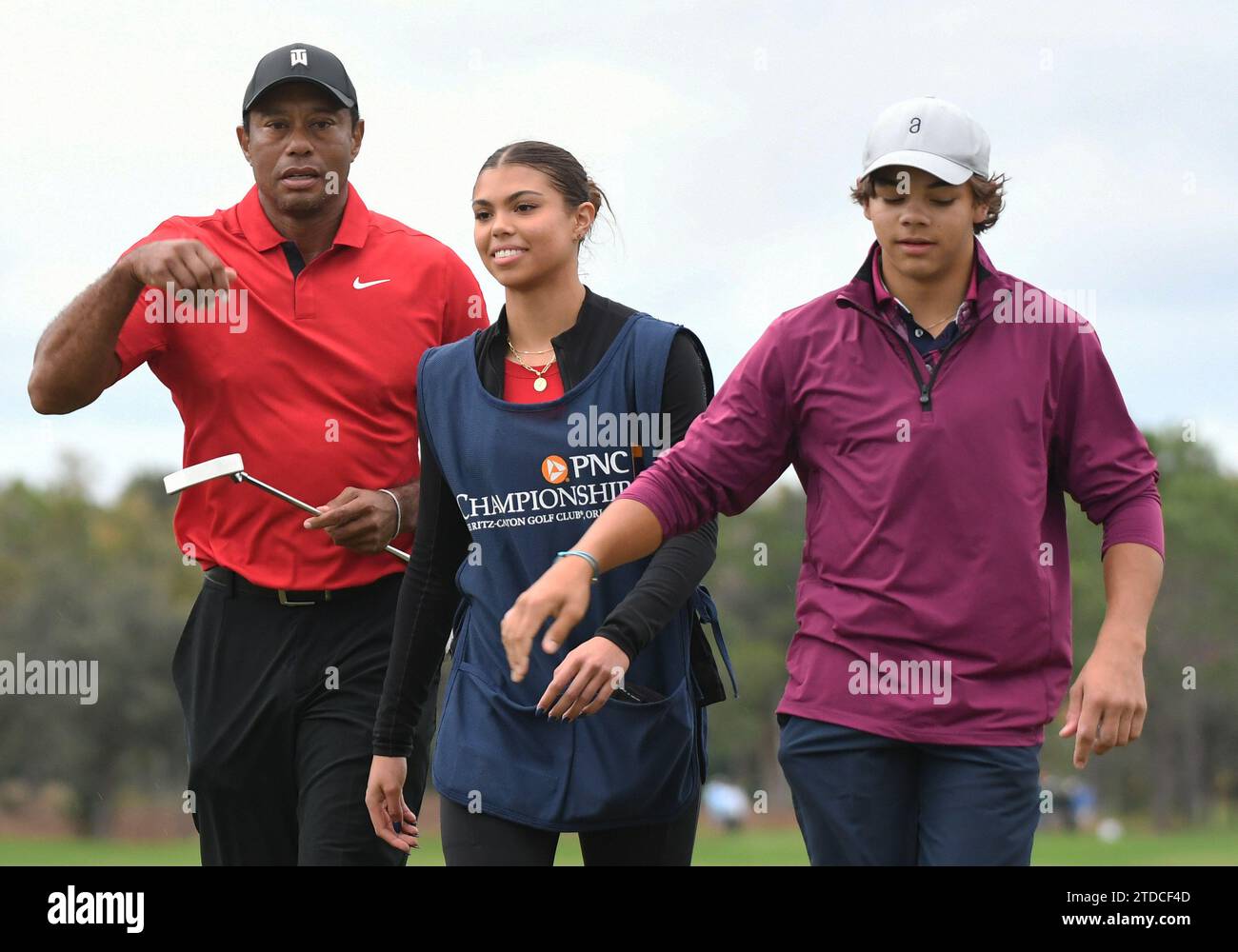 Orlando, United States. 17th Dec, 2023. Tiger Woods (L), his daughter ...