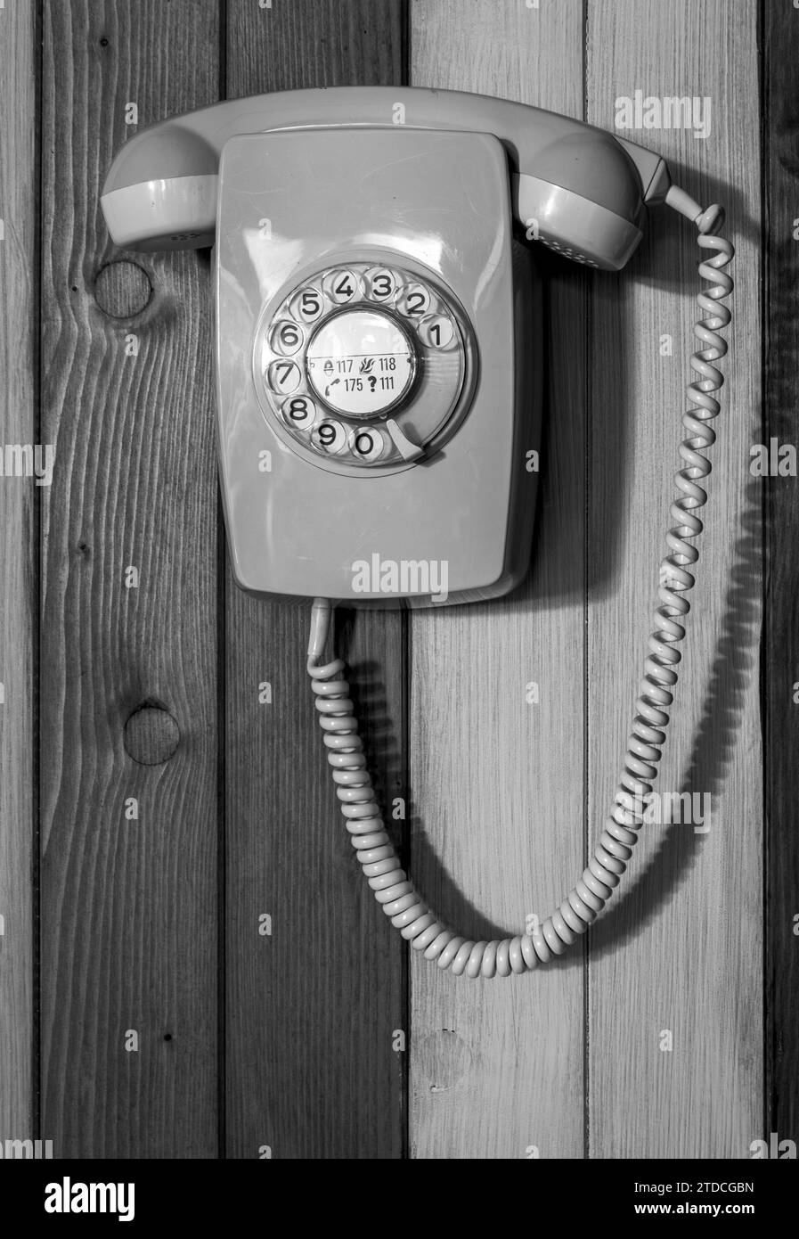 Old analogue cable telephone at a wall, close-up picture Stock Photo ...