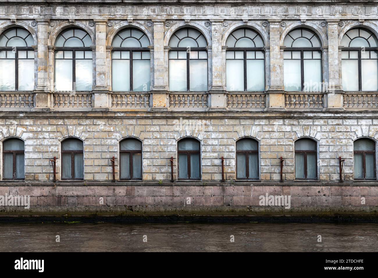 Background texture of an old house wall in classic style with arched ...