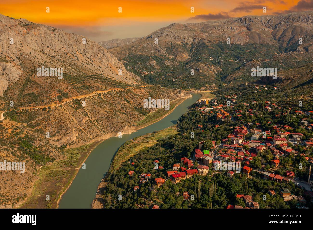 Valley view of Kemaliye town. View of the old Kemaliye houses and the ...