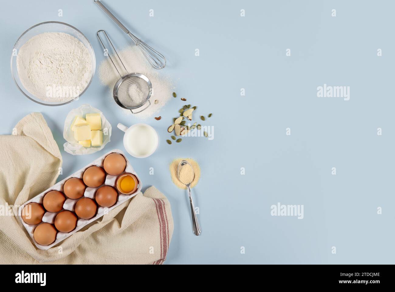 Composition of ingredients for baking on colored paper (eggs, flour ...