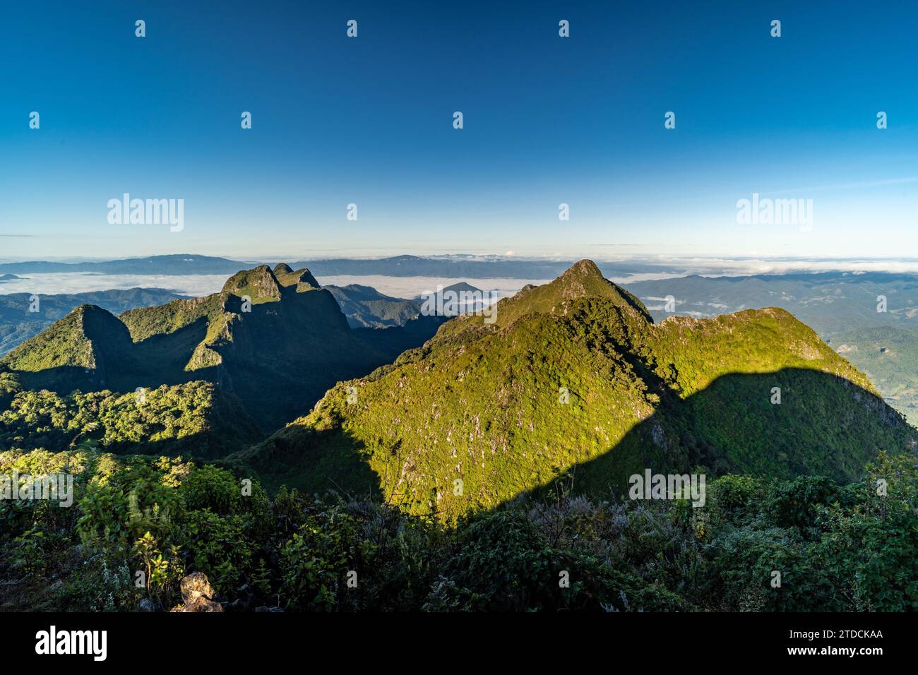 View from the top of Doi Luang Chiang Dao during a morning sunrise with ...