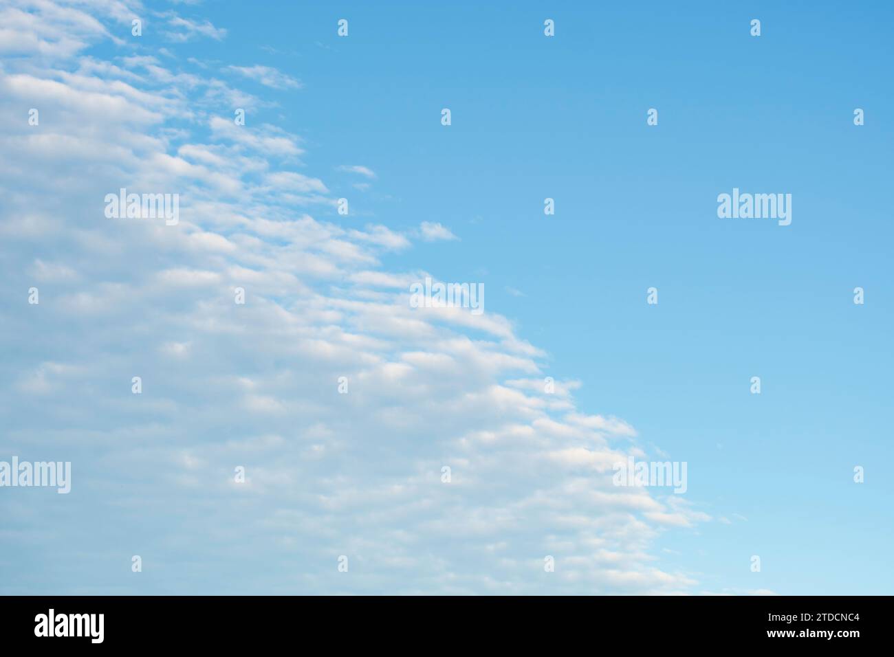 Winter weather front of cloudbank with clear blue sky background Stock ...