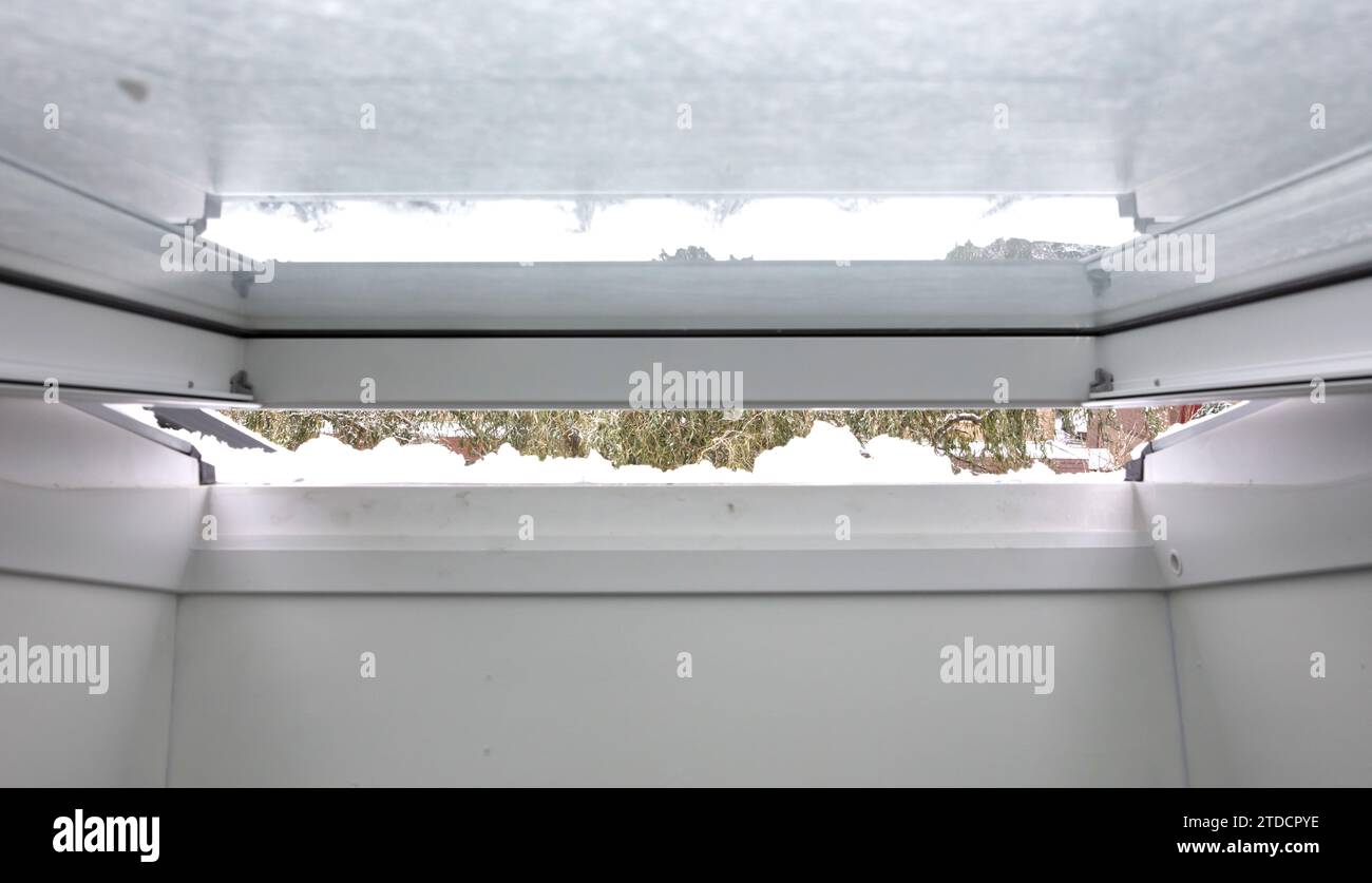 Melted snow on the roof window hi-res stock photography and images - Alamy