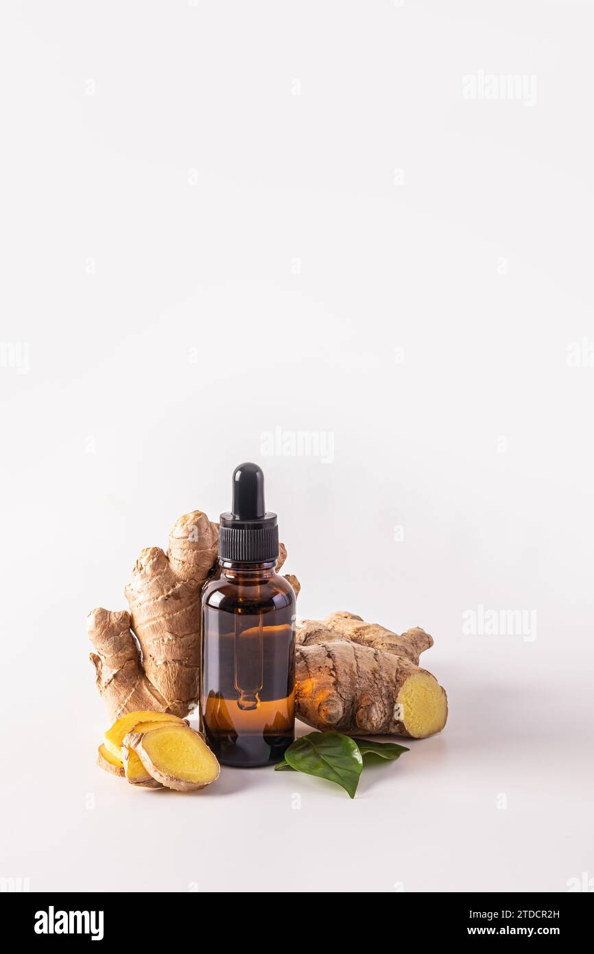 Cosmetic bottle with dropper with natural ginger oil, serum ginger root ...