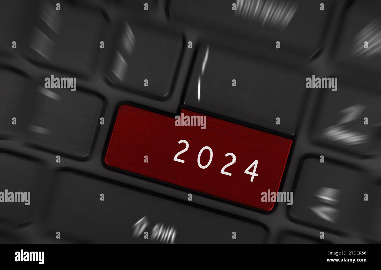 Modern black computer keyboard with return key coloured red, 2024 ...