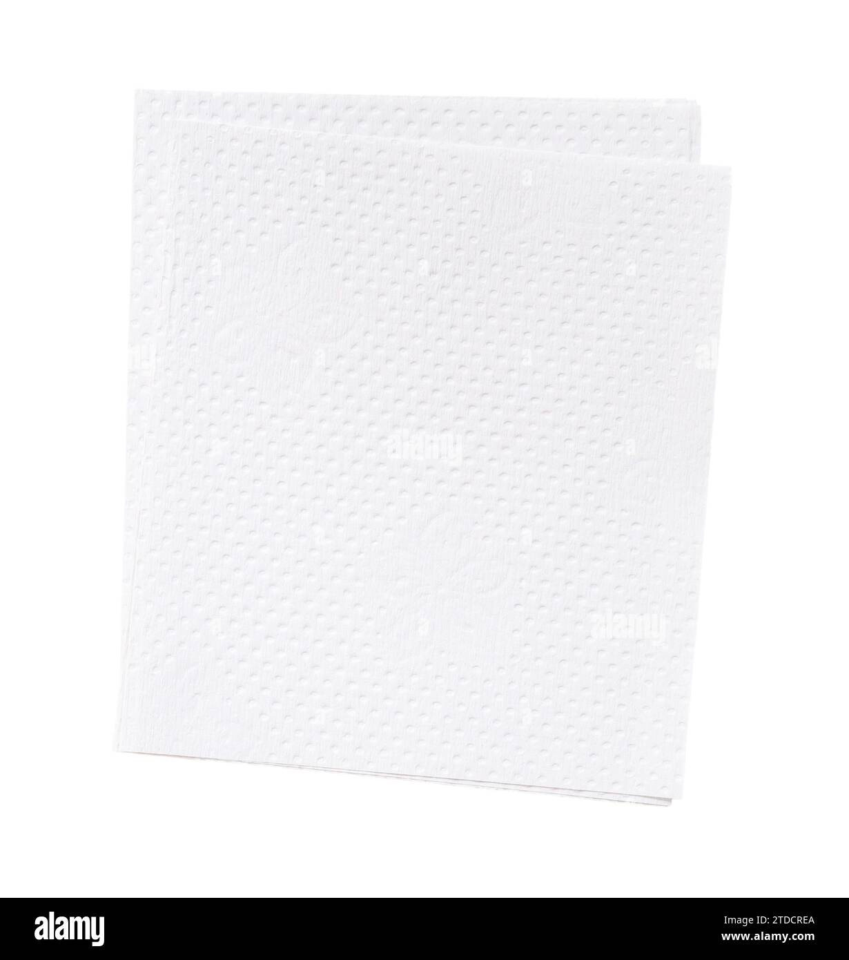 Two folded pieces of white tissue paper or napkin in stack tidily ...