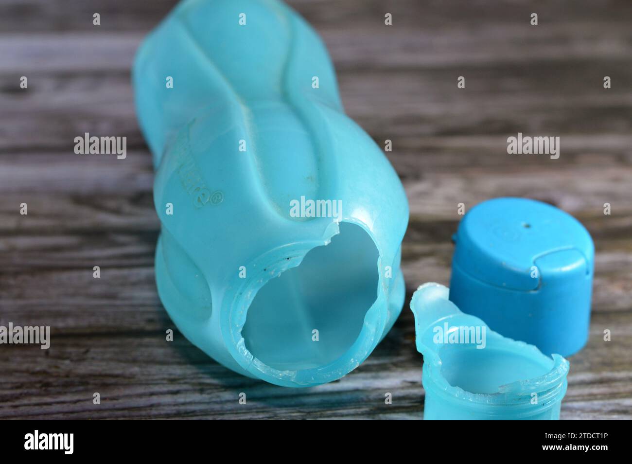 Cairo, Egypt, December 16 2023: broken fragments of a Tupperware bottle ...