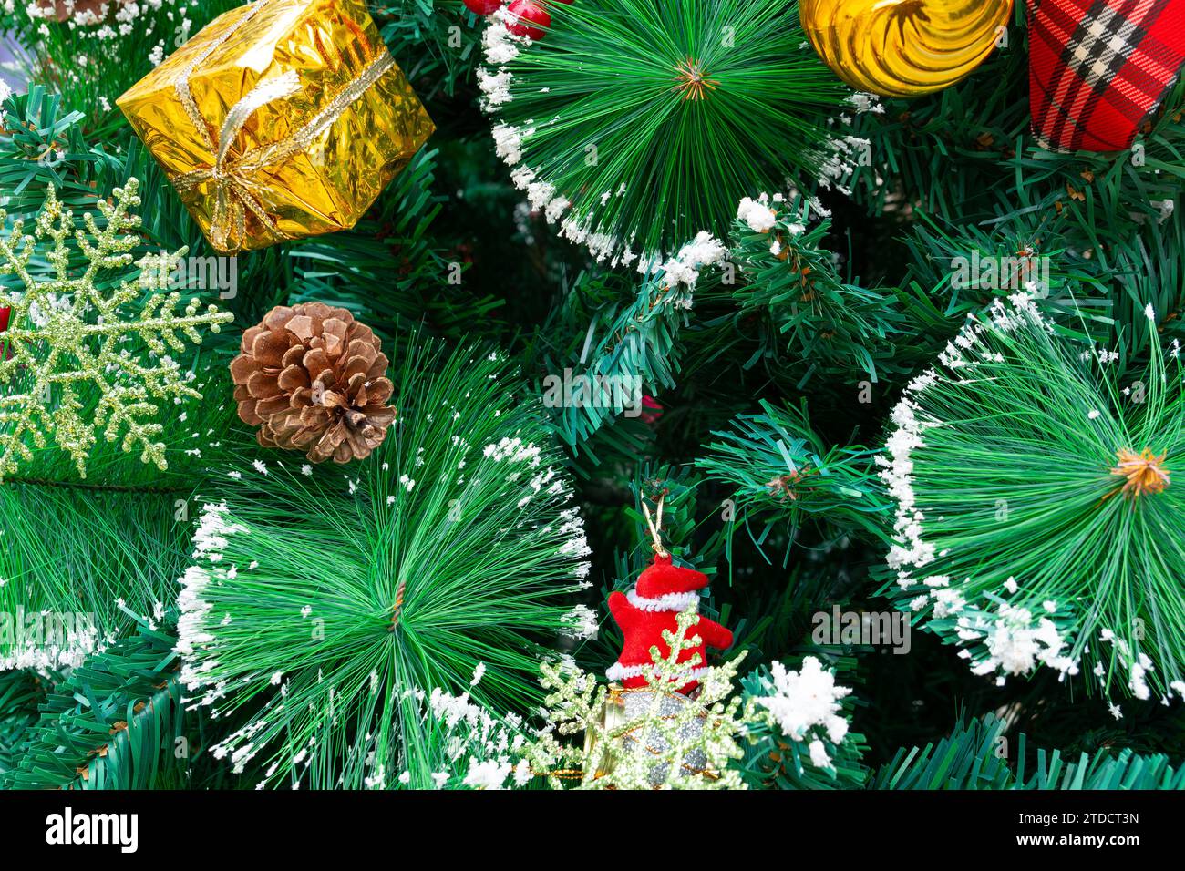 part of Christmas tree with decorations close up at horizontal ...