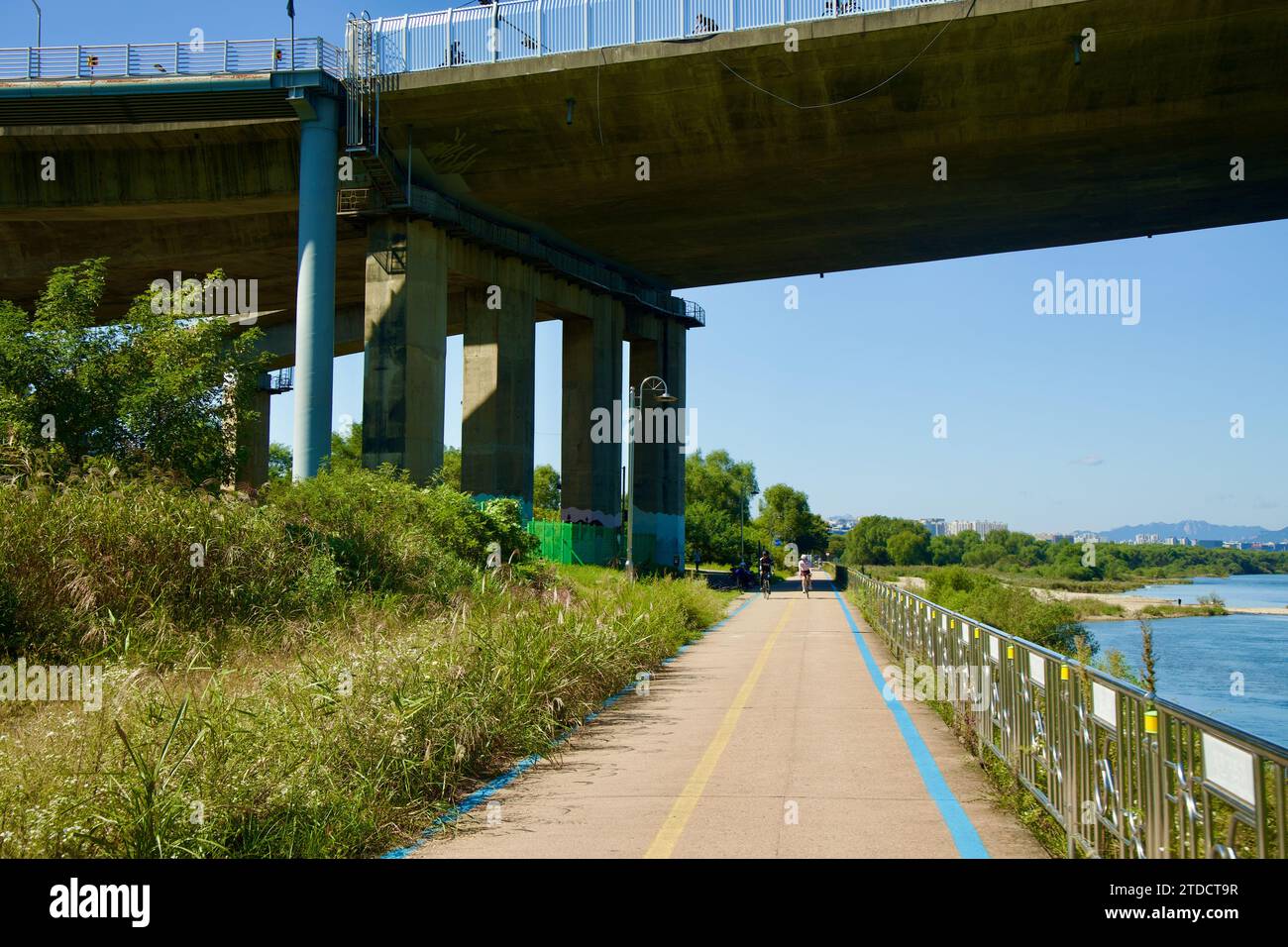 Hanam City, South Korea - October 1, 2023: A cyclist traverses the ...