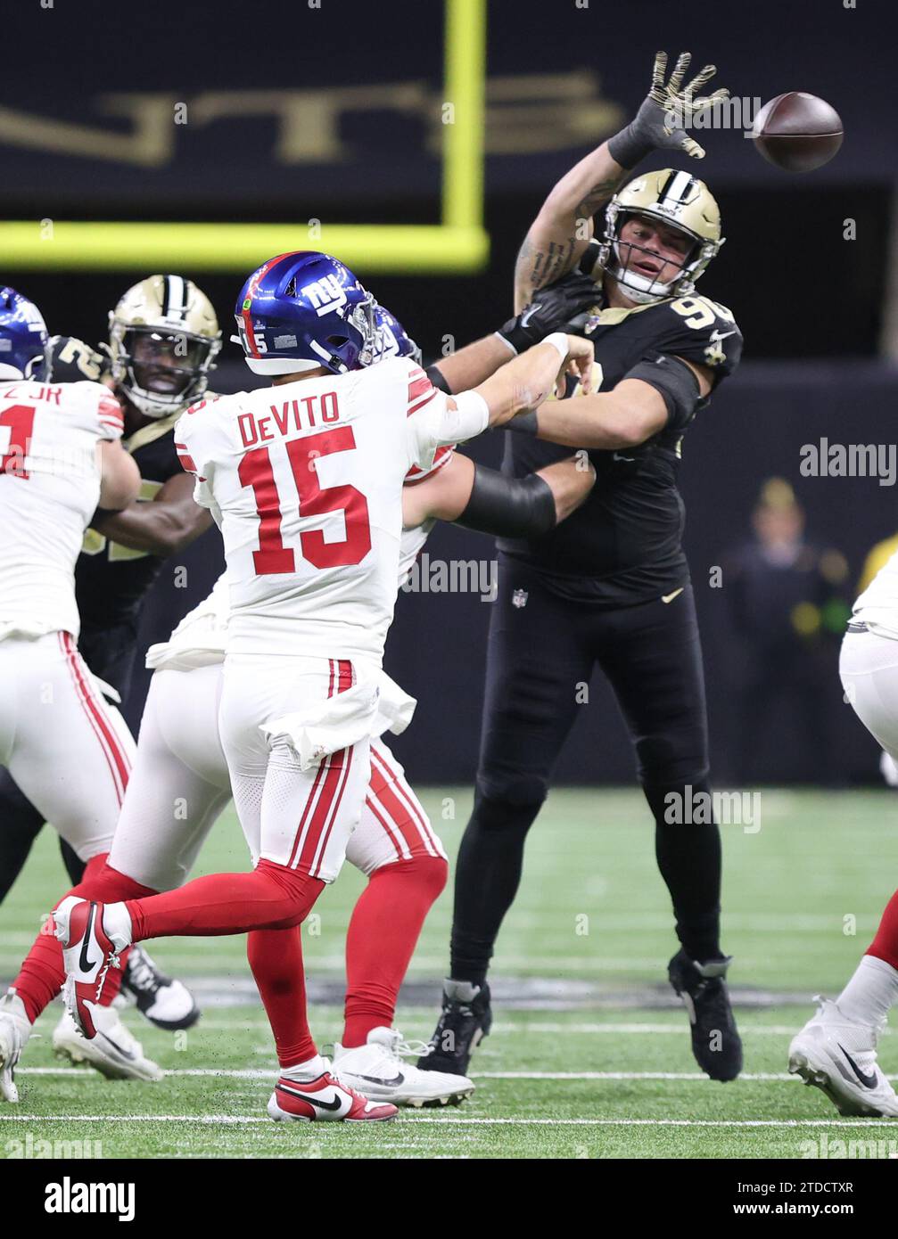 New Orleans, USA. 17th Dec, 2023. New Orleans Saints defensive tackle Bryan Bresee (90) tries to ...