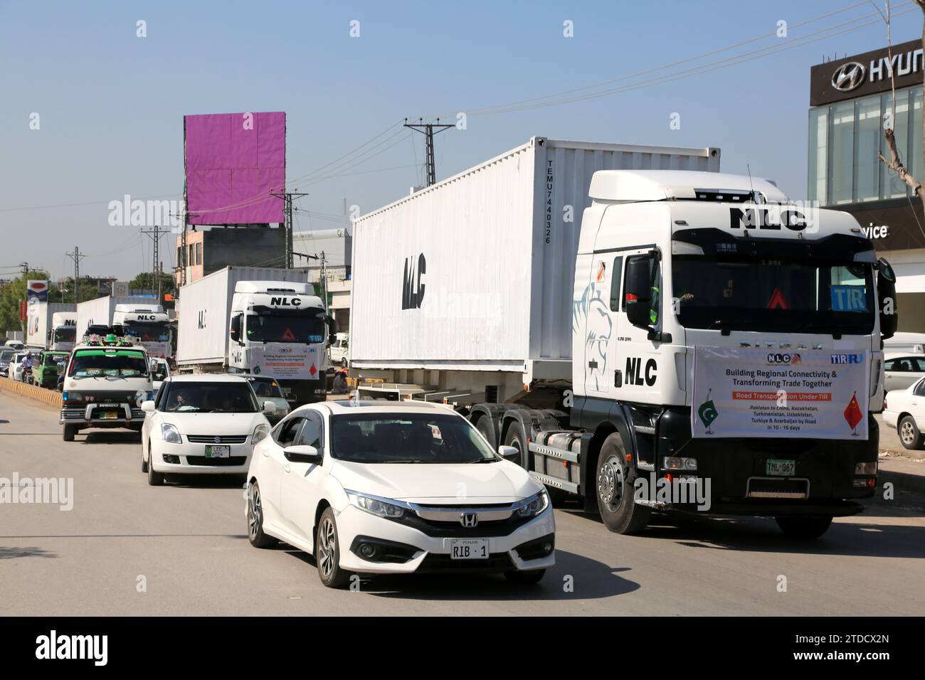 Rawalpindi. 10th Oct, 2023. Vehicles with TIR signs are seen on a road ...
