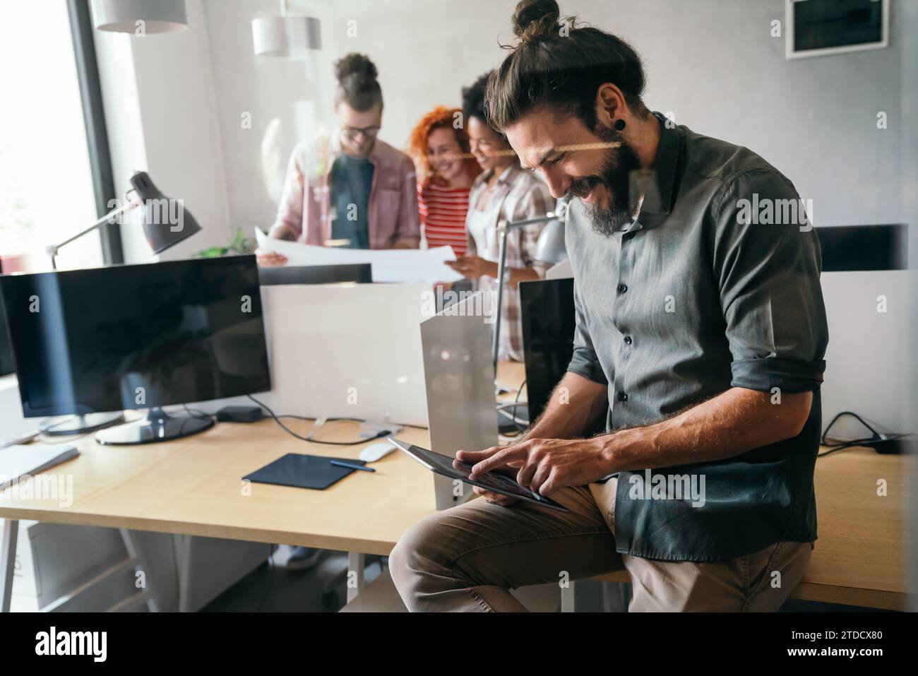 Happy software developers working on meeting, Programming advanced code ... Happy software developers working on meeting, Programming advanced code ...
