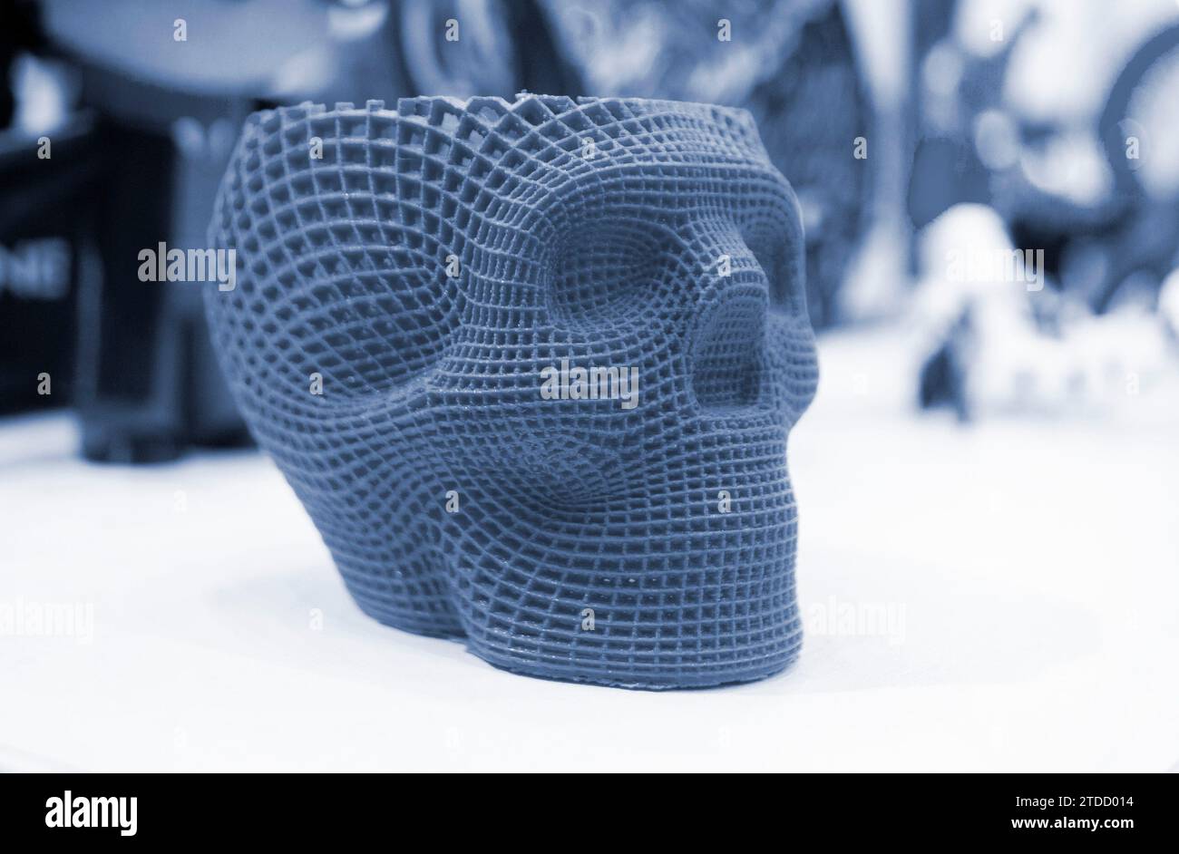 Prototype of human skull printed on 3D printer from molten purple ...
