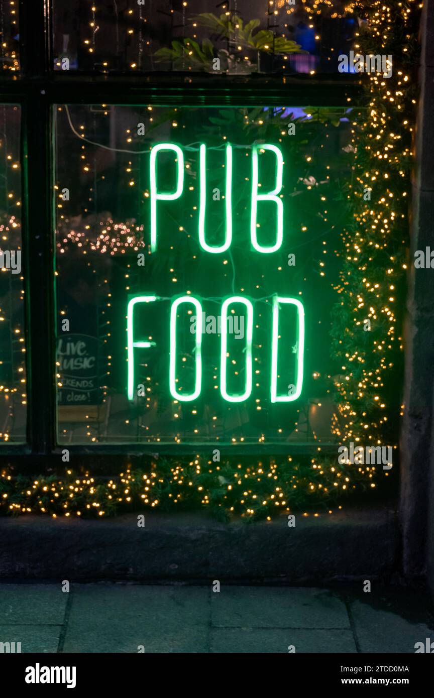 Neon sign in pub window in Liverpool Stock Photo - Alamy