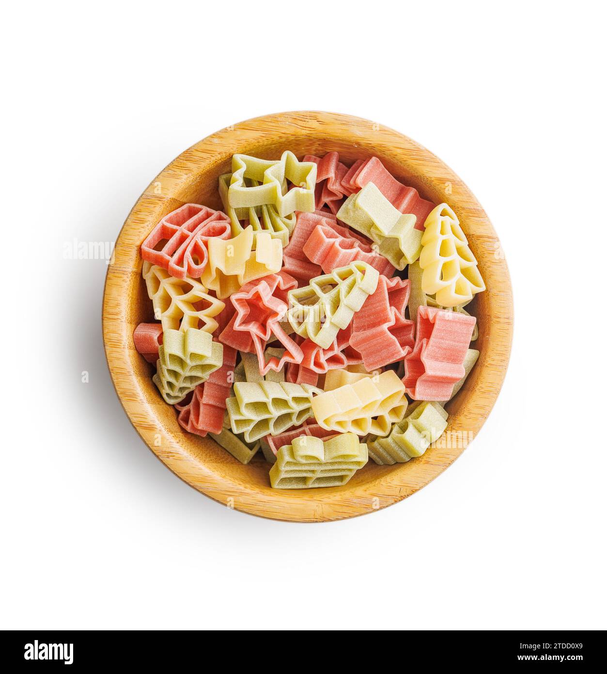 Uncooked raw pasta. Various Christmas shapes. Pasta in bowl isolated on ...