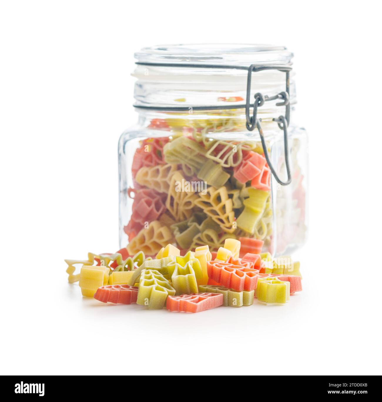 Uncooked raw pasta. Various Christmas shapes. Pasta in jar isolated on ...