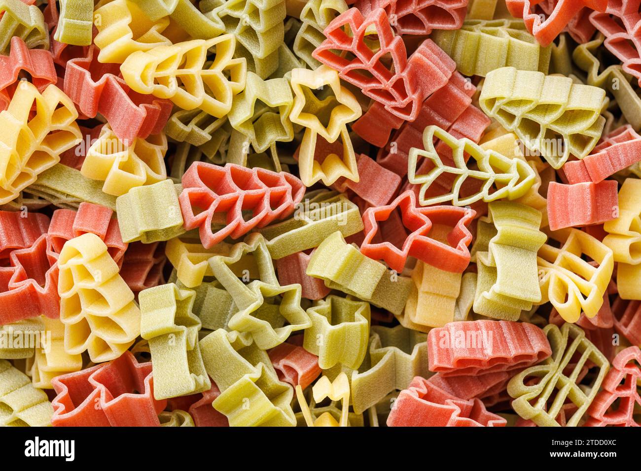 Uncooked raw pasta. The various Christmas shapes. Top view Stock Photo ...