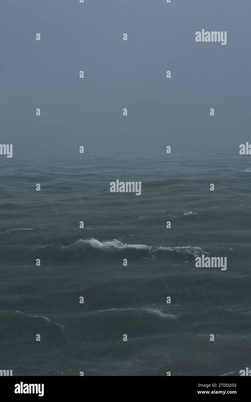 Rain falling over the Mediterranean sea Stock Photo - Alamy