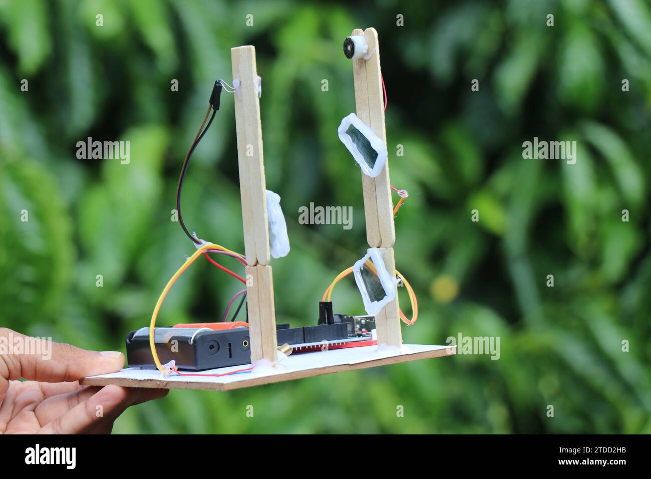 Working model of a science project made with a few electronics held in ...