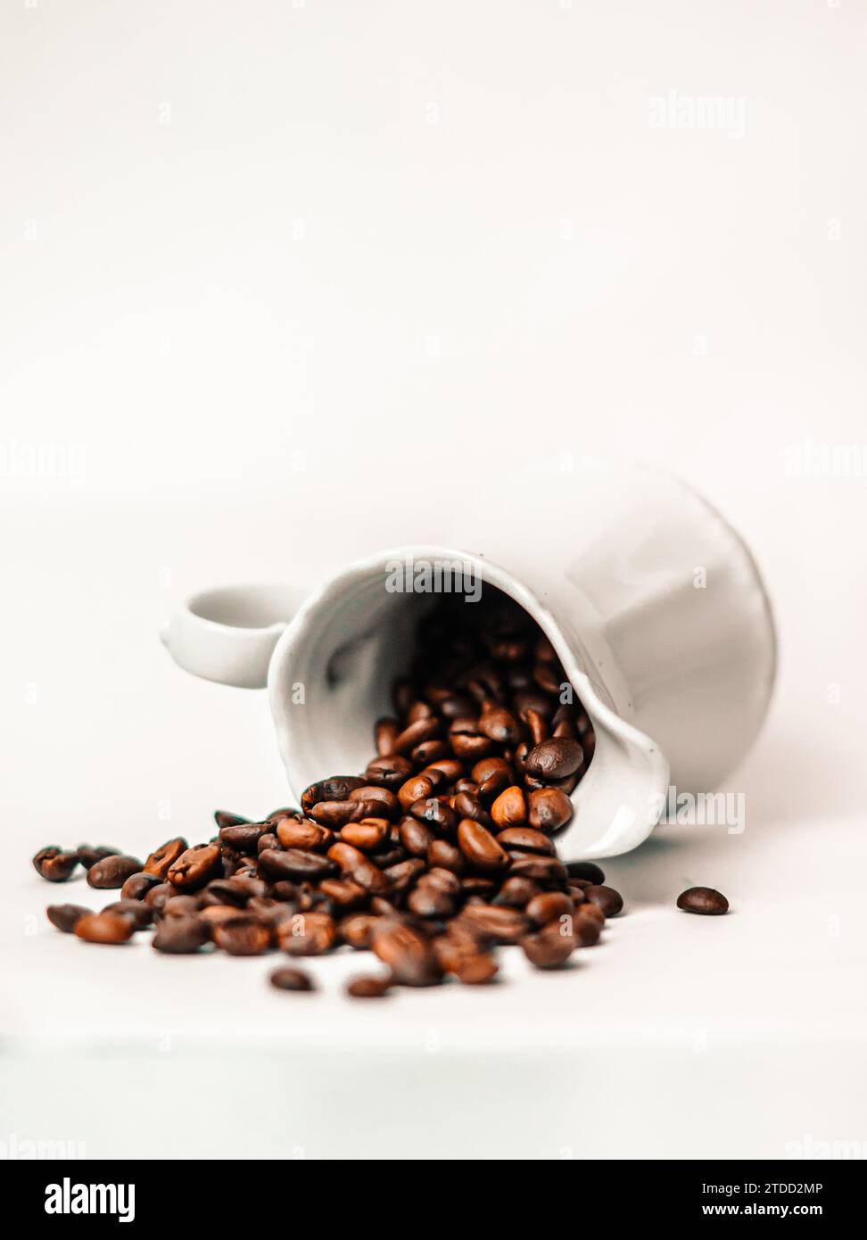 Coffee Beans Spilling Cafe Drink Stock Photo - Alamy