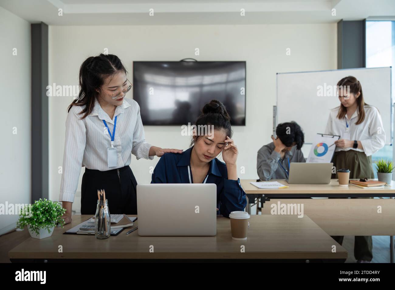 Employee sit at office meeting have stressful job situation, encourage ...