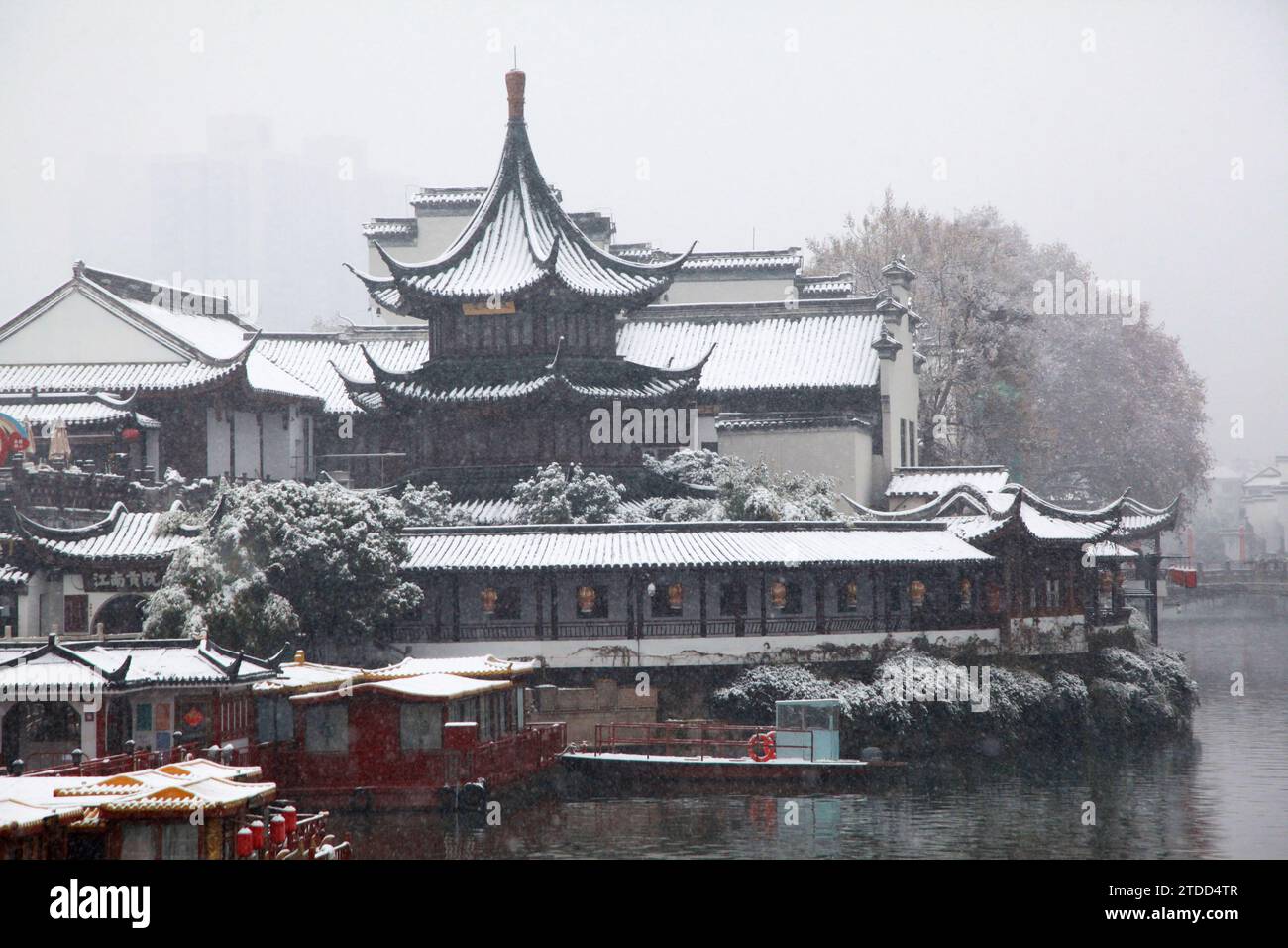 NANJING, CHINA - DECEMBER 18, 2023 - Tourists enjoy the snow scenery at ...