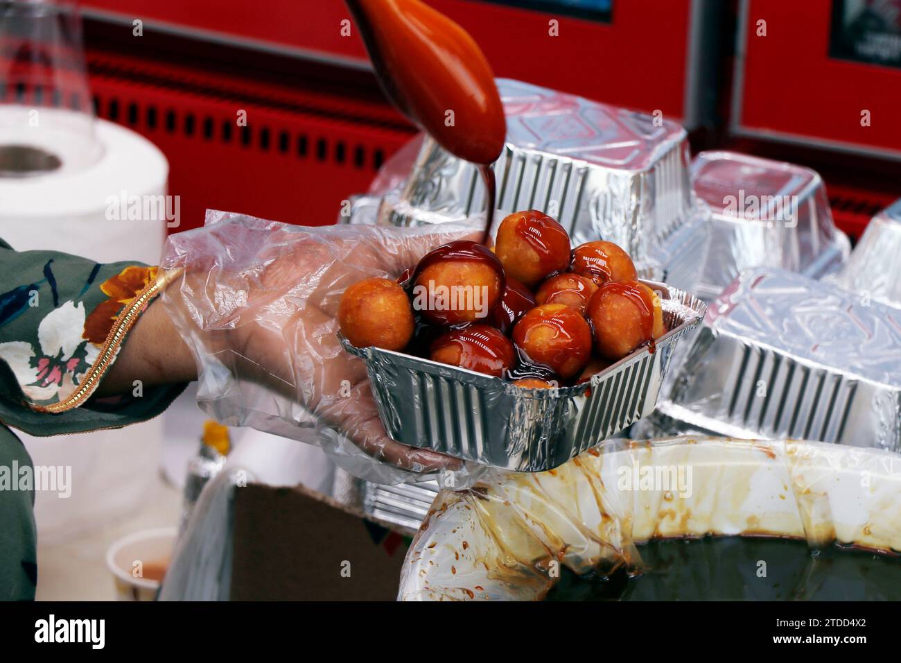 arabic street food Logma or Legaimat (Lugaimat) preparation, is one of ...