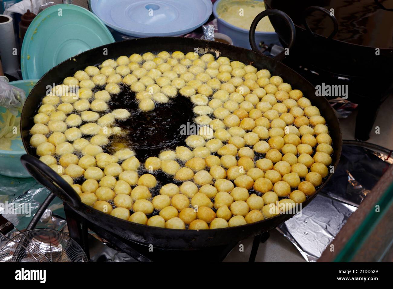 arabic street food Logma or Legaimat (Lugaimat) preparation, is one of ...