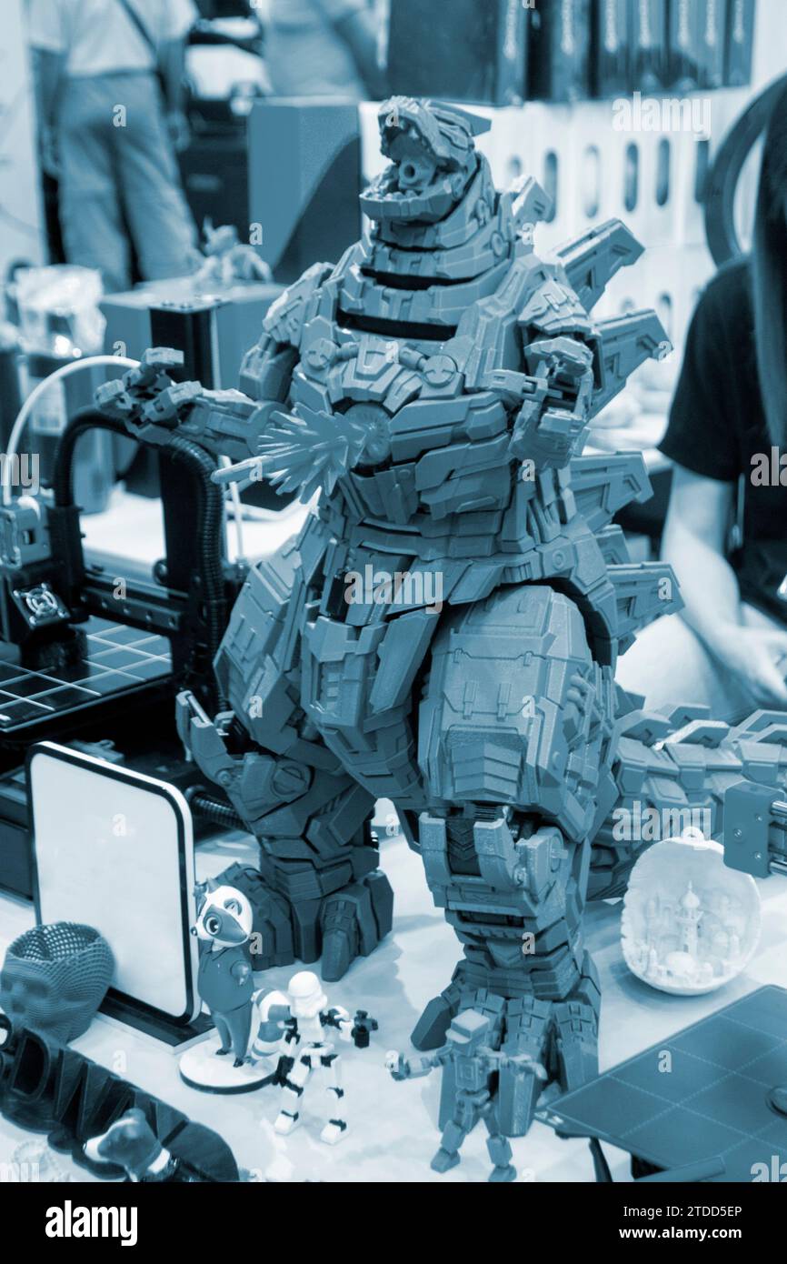 Art object printed on 3D printer. Robot toy created on 3D printer. Blue ...