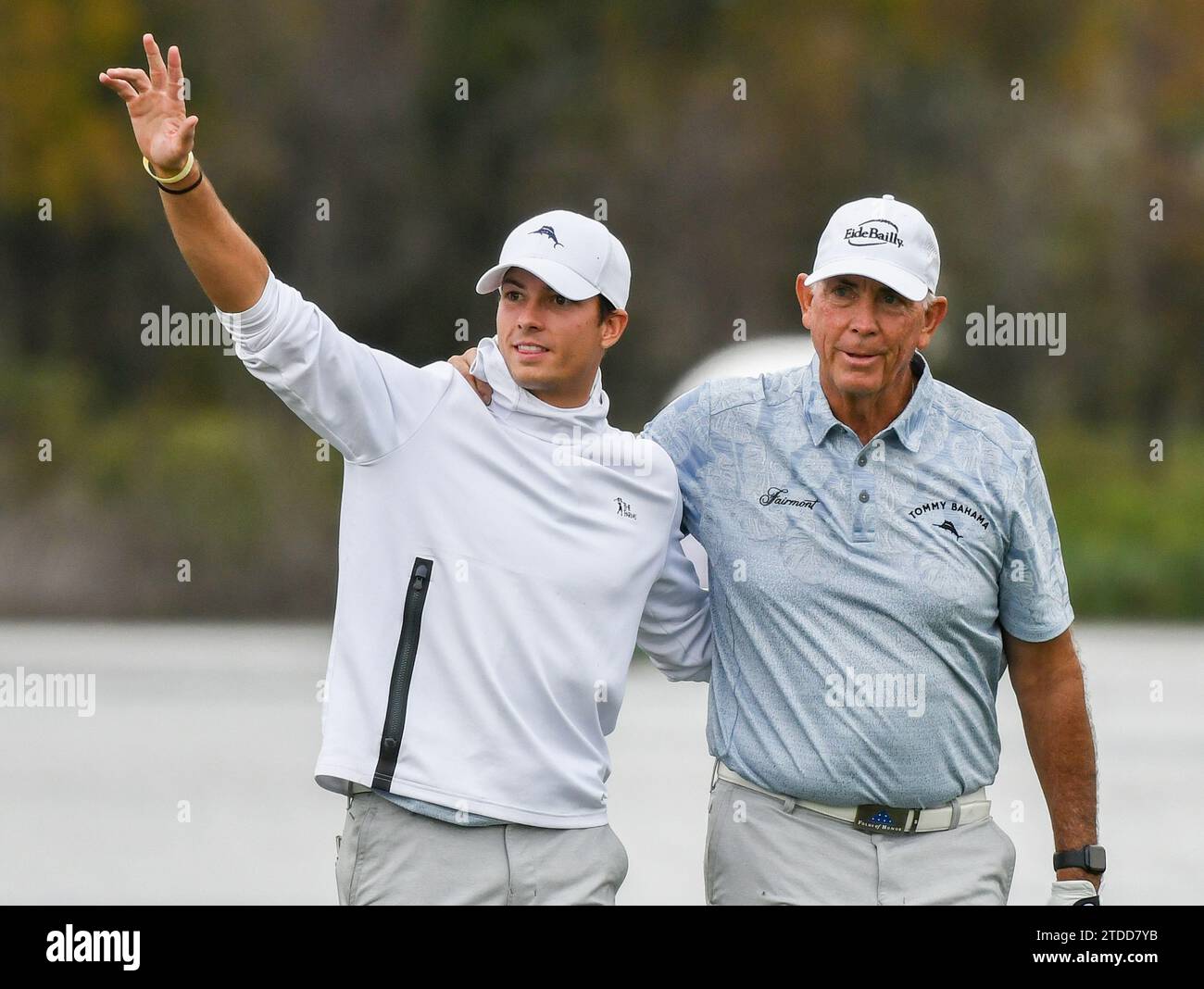 Sean Lehman and his father, Tom Lehman, acknowledge the crowd as they ...