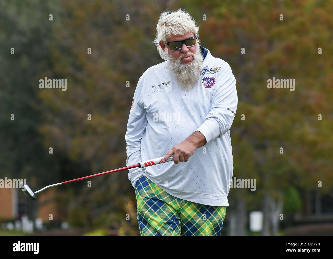 John Daly reacts as his son, John Daly II (off camera), putts on the ...