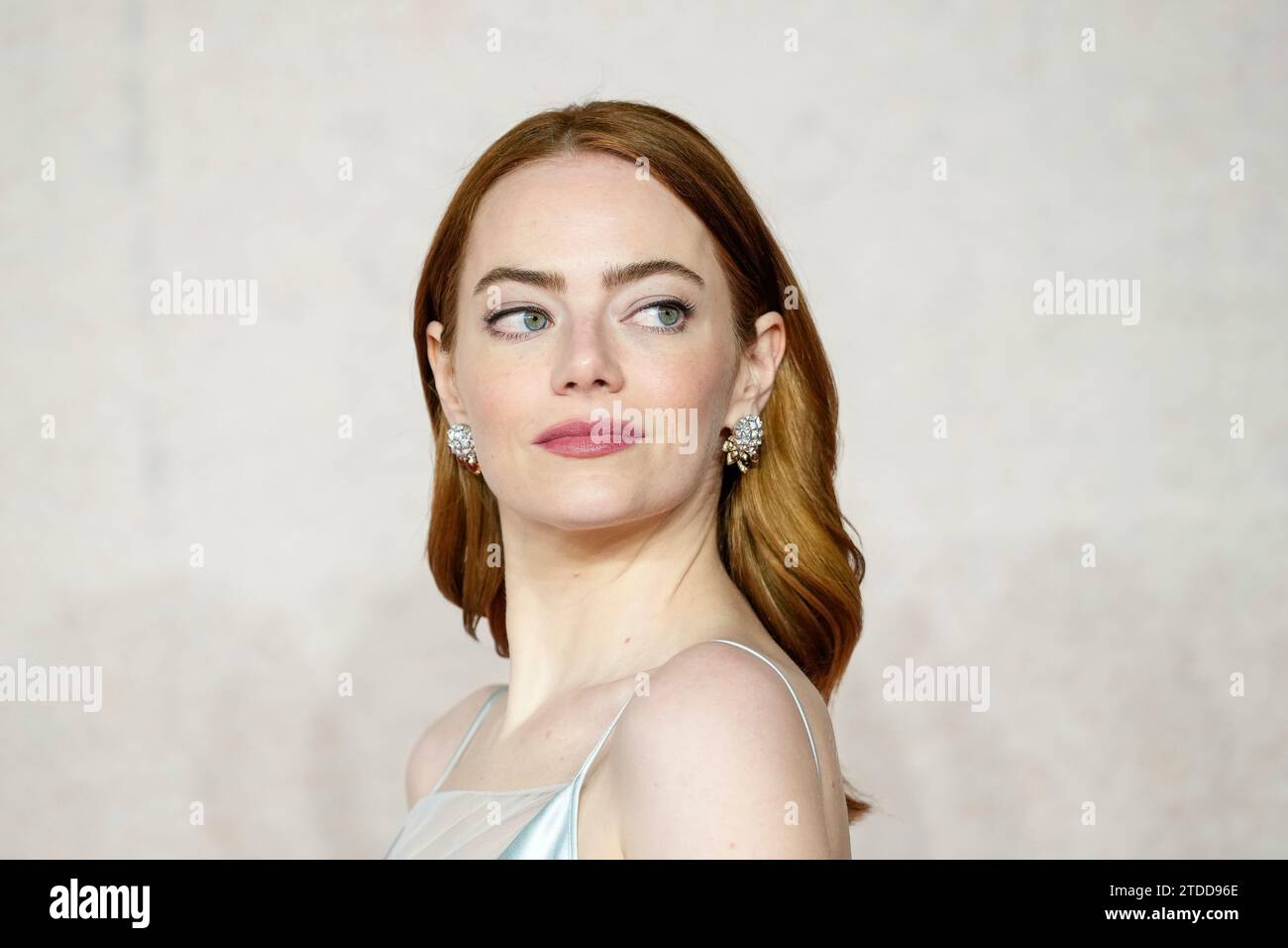 Emma Stone poses for photographers upon arrival at the premiere of the ...