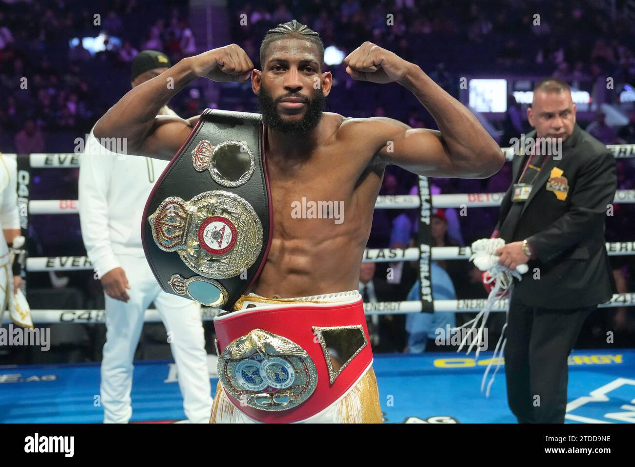 Andy Cruz poses after defeating Jovanni Straffon during a WBA and IBF ...