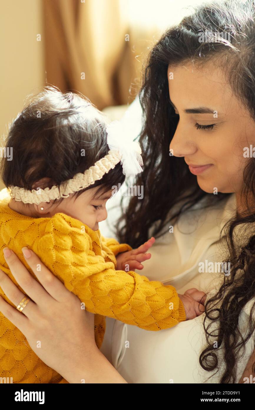 Mother holding her newborn baby girl Stock Photo - Alamy Mother holding her newborn baby girl Stock Photo - Alamy