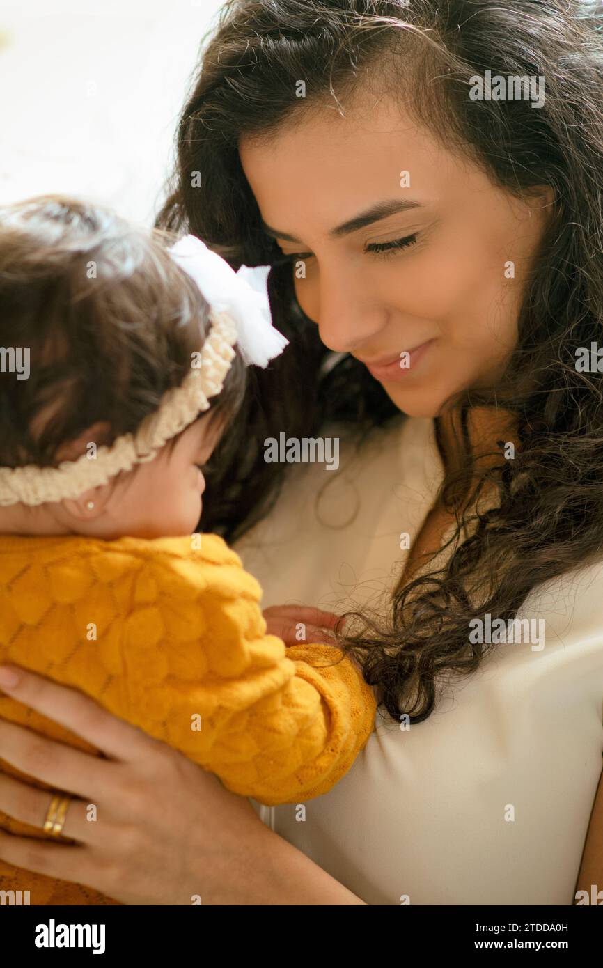 Mother holding her newborn baby girl Stock Photo - Alamy Mother holding her newborn baby girl Stock Photo - Alamy