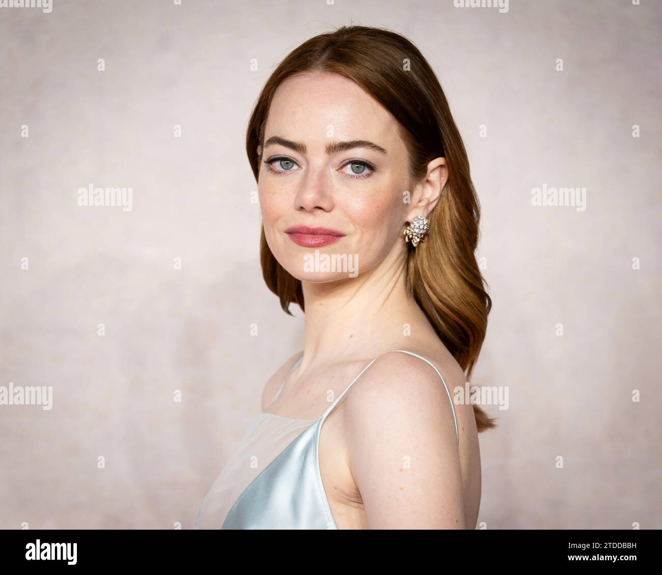 Emma Stone poses for photographers upon arrival at the premiere of the ...