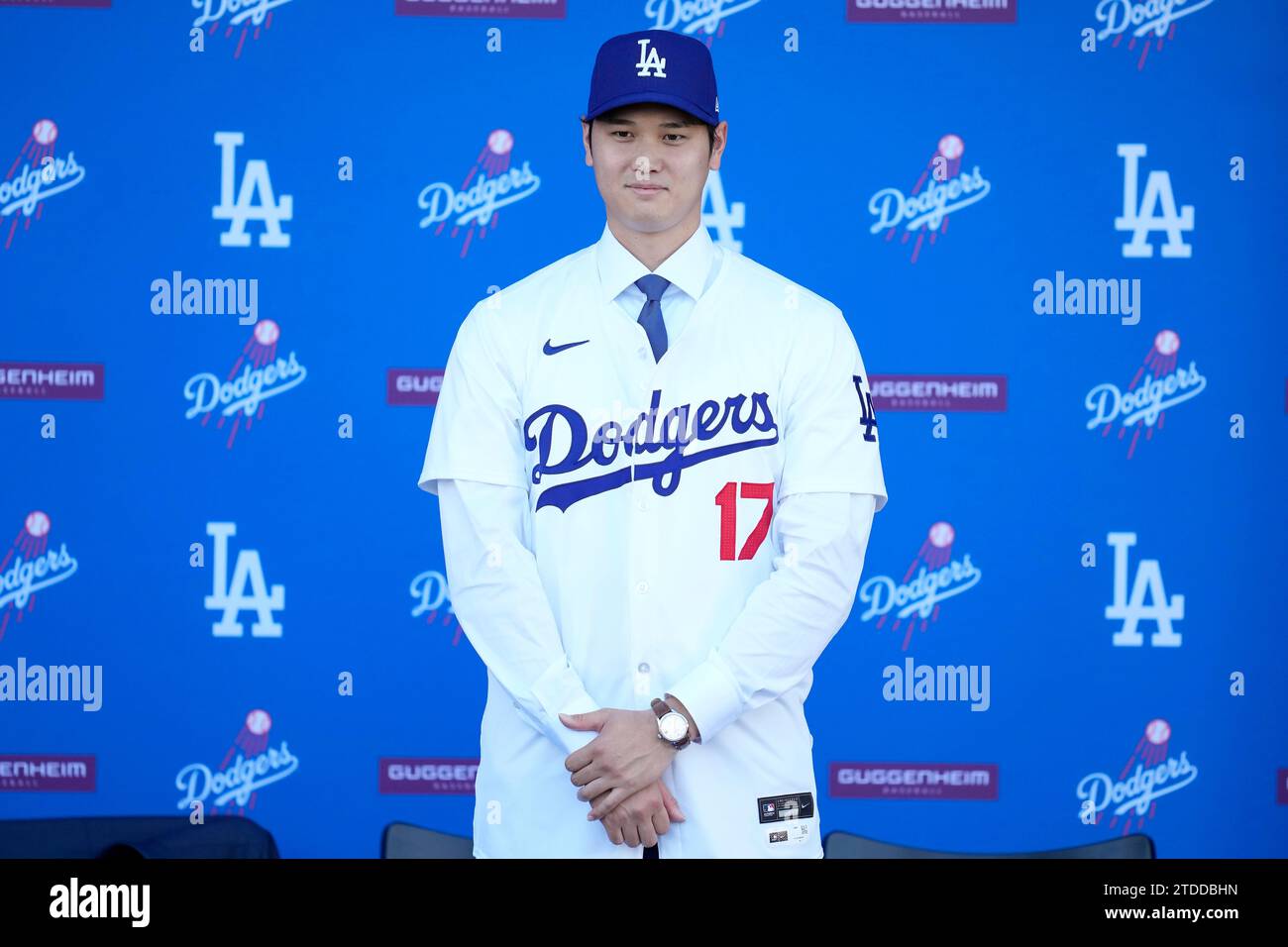 Los Angeles Dodgers' Shohei Ohtani wears a jersey and baseball cap ...