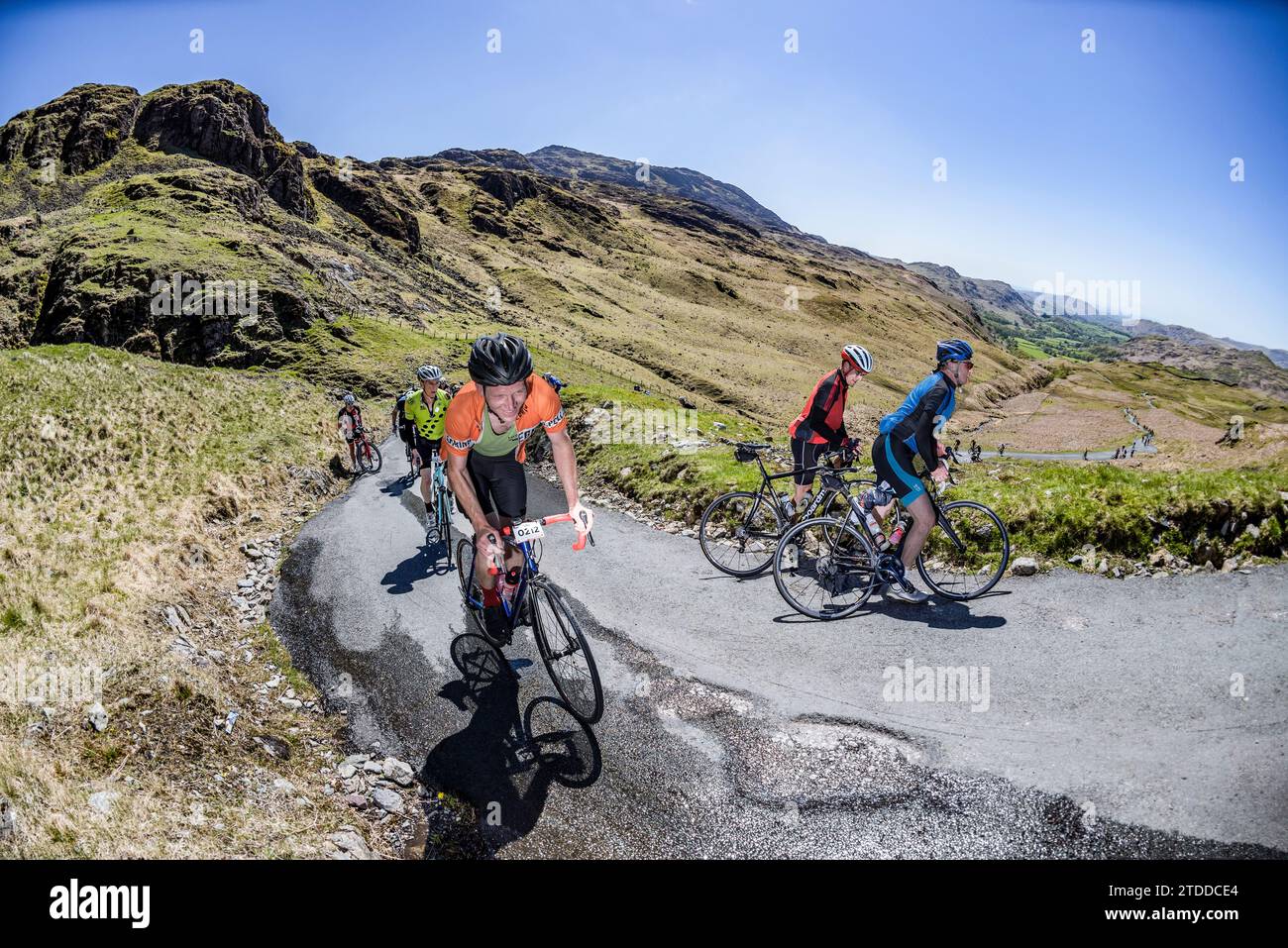 Cyclist climbing Hardknott Pass in the Fred Whitton Challenge, English ...