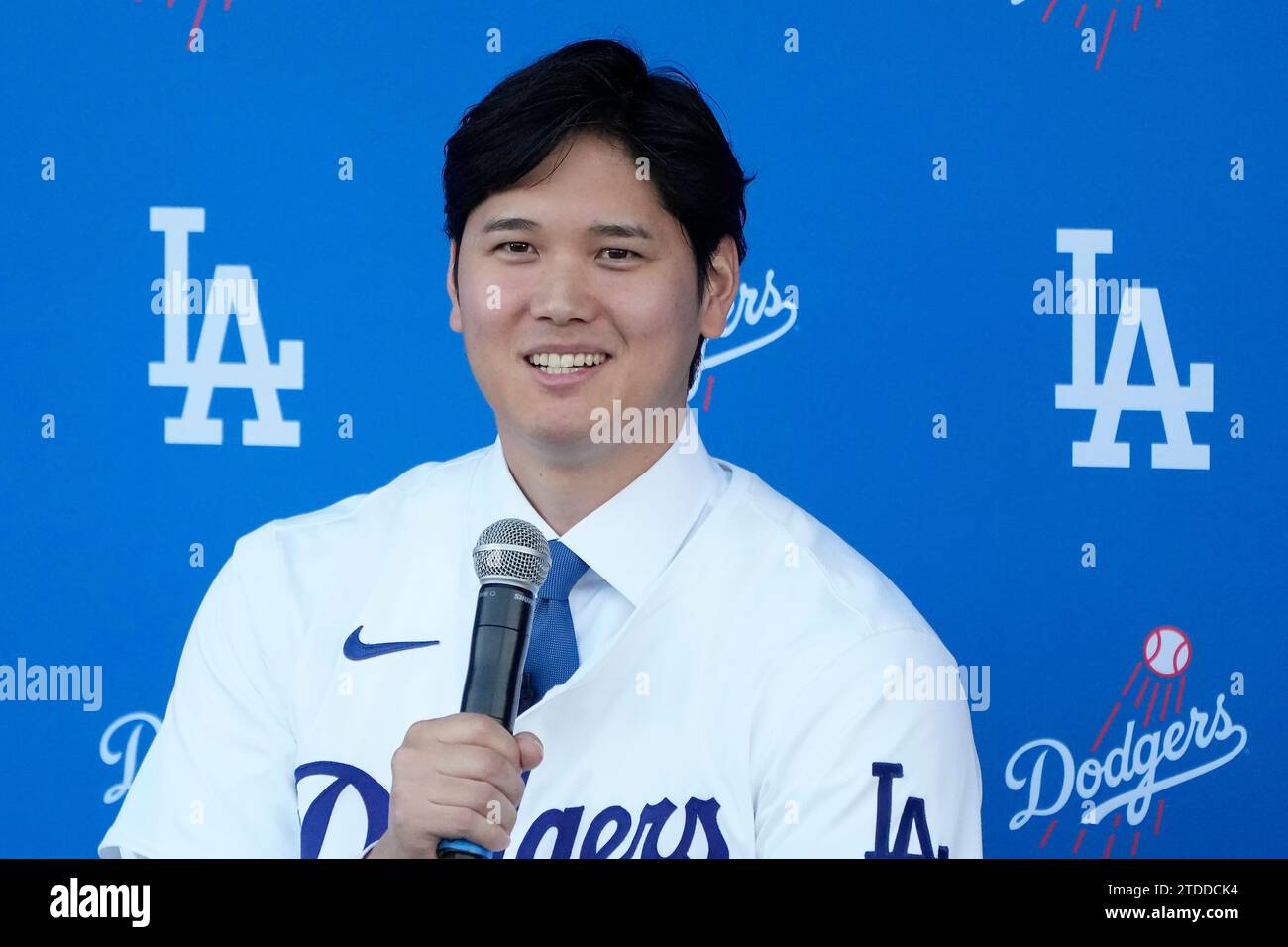 Los Angeles Dodgers' Shohei Ohtani speaks during a baseball news ...