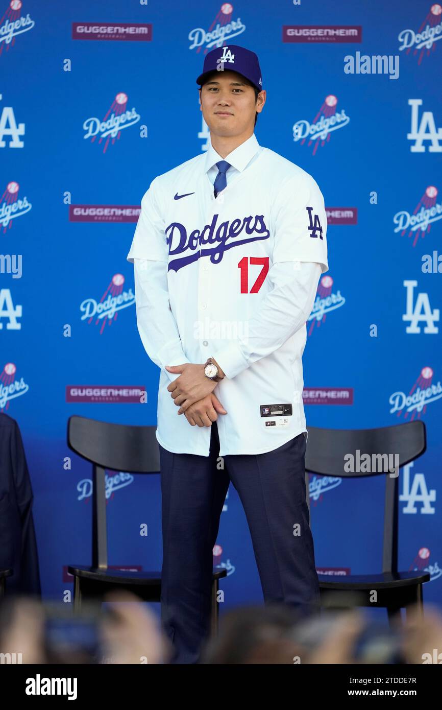 Los Angeles Dodgers' Shohei Ohtani poses for photos during a baseball ...