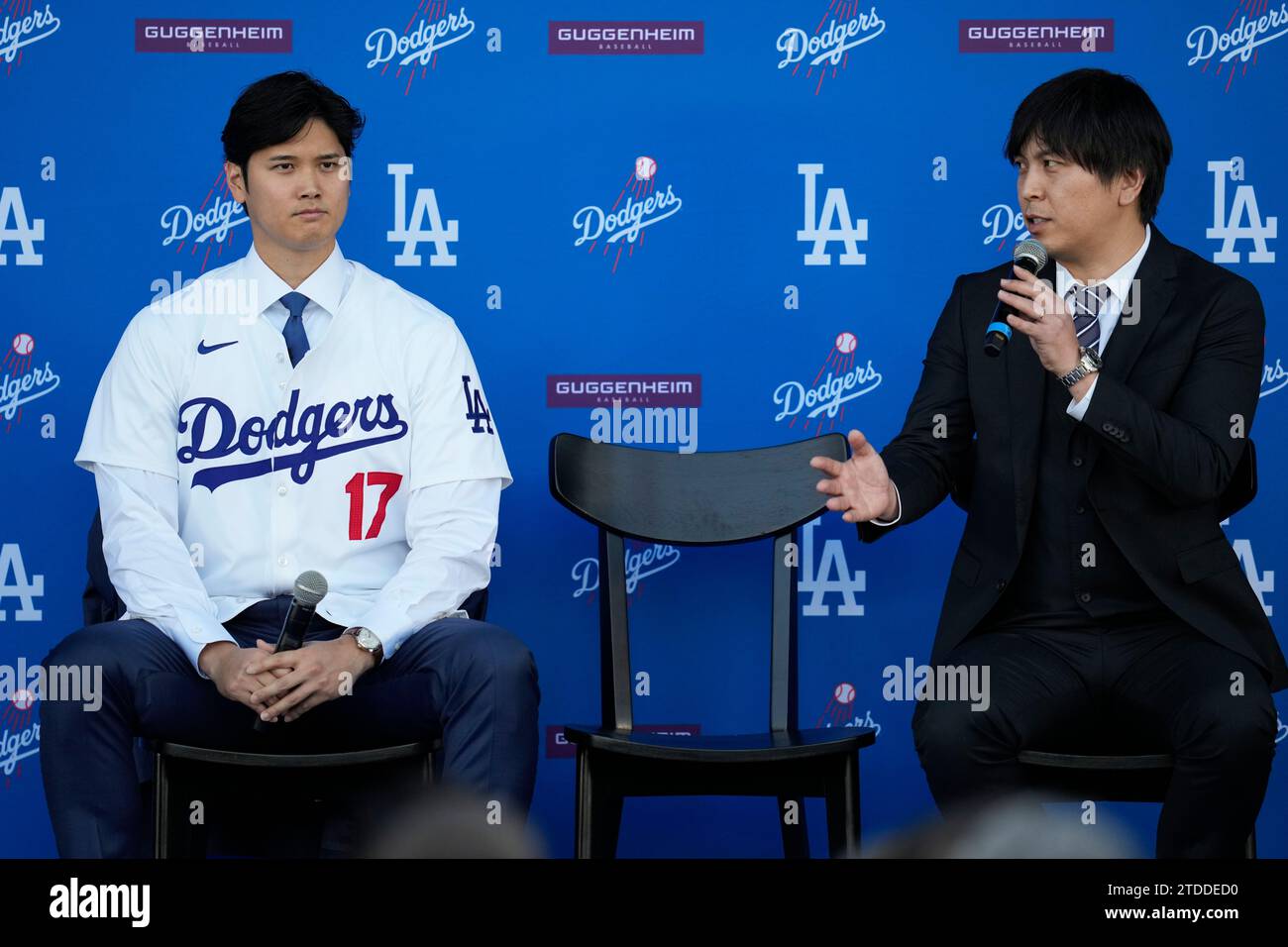 Los Angeles Dodgers' Shohei Ohtani, left, and interpreter Ippei ...