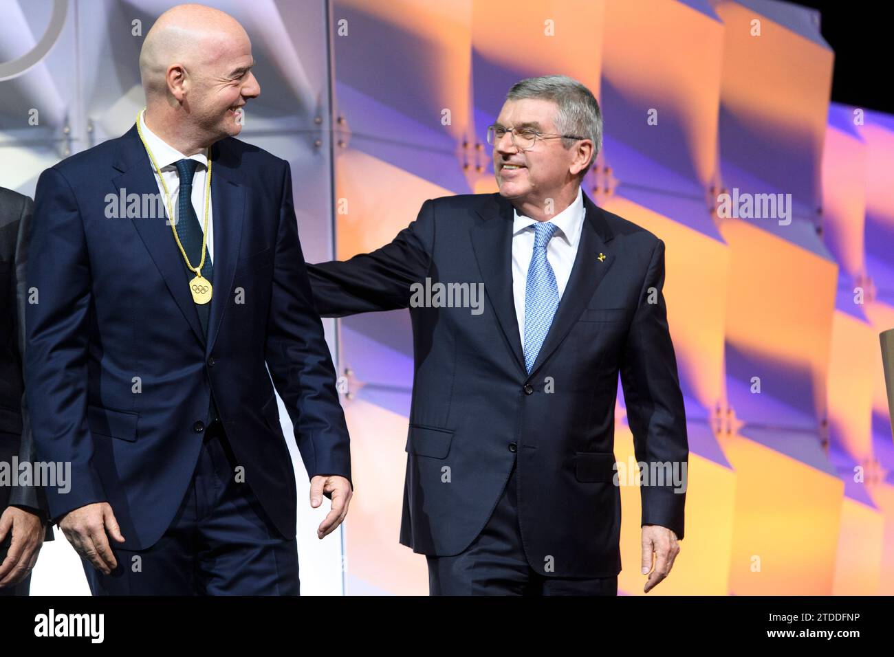 FILE - FIFA President Gianni Infantino, left, speaks with IOC president Thomas Bach after he was ...