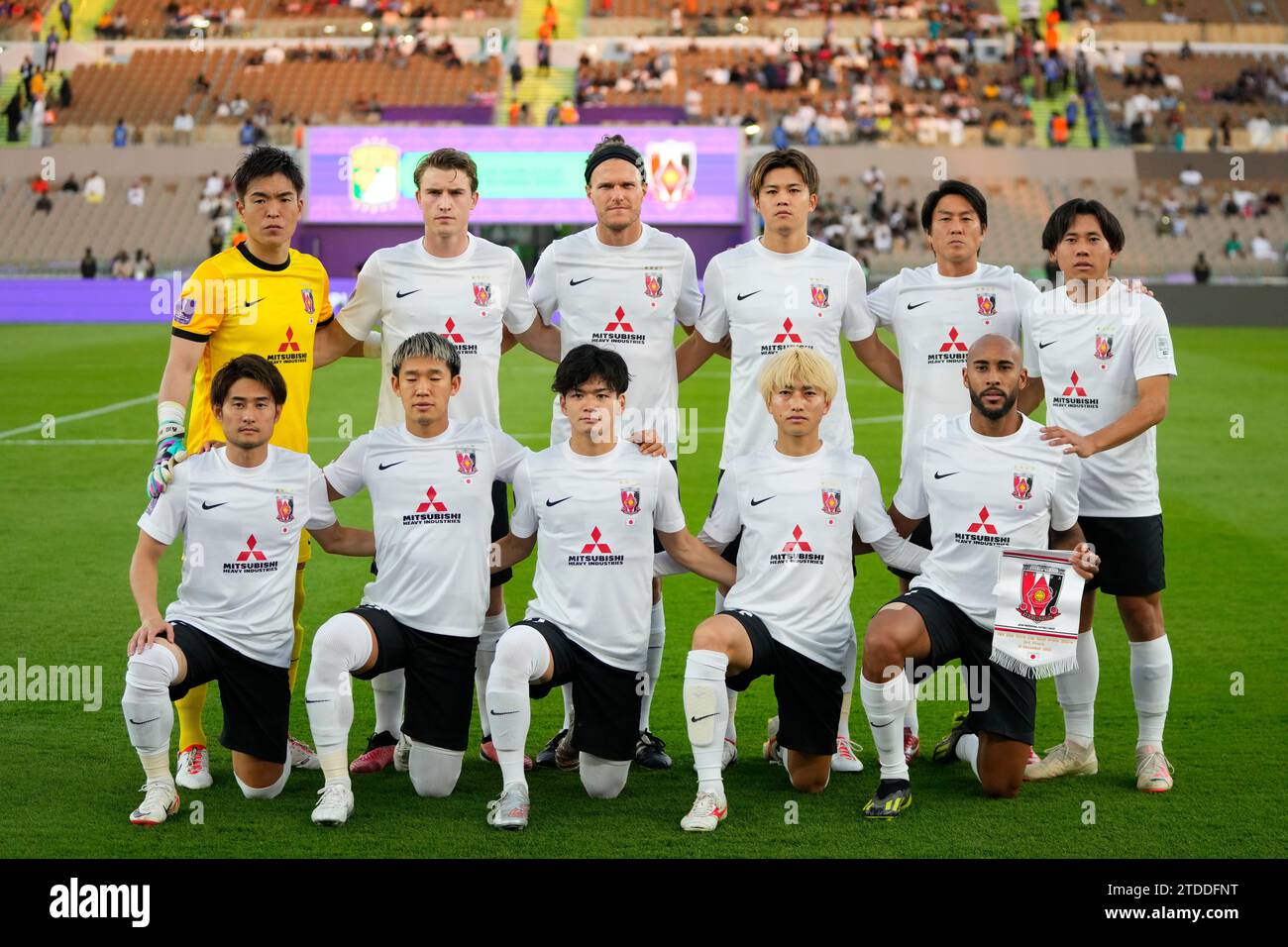 Urawa Reds' starting players pose for a team photo prior to the Soccer ...