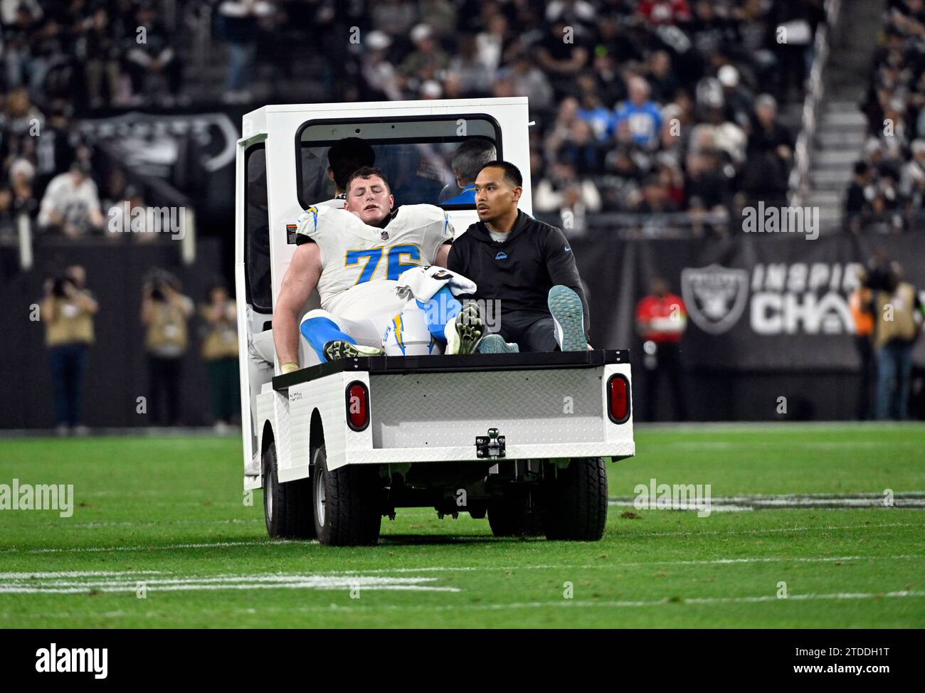 Los Angeles Chargers center Will Clapp (76) is carted off the field ...