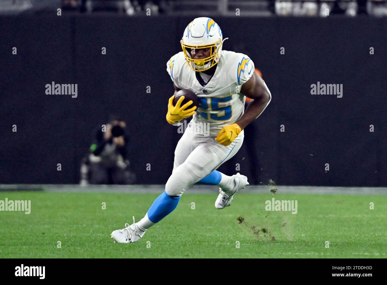Los Angeles Chargers running back Joshua Kelley (25) runs with the ball ...