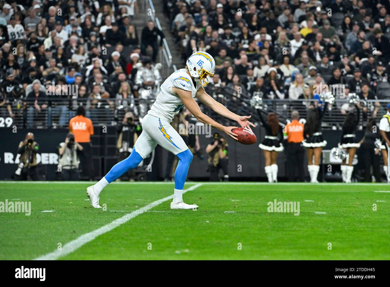 Los Angeles Chargers punter JK Scott (16) kicks the ball against the ...
