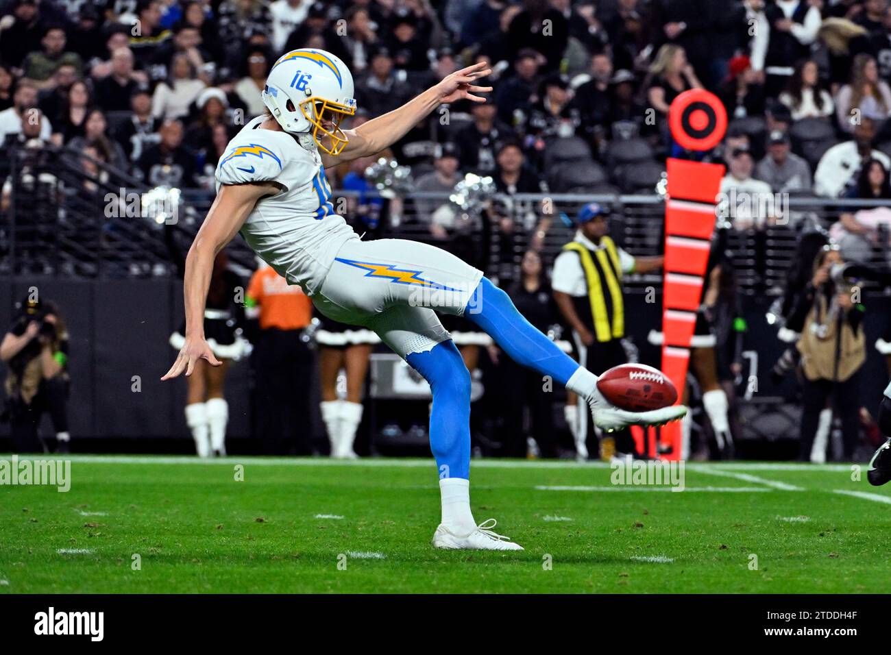 Los Angeles Chargers punter JK Scott (16) kicks the ball against the ...