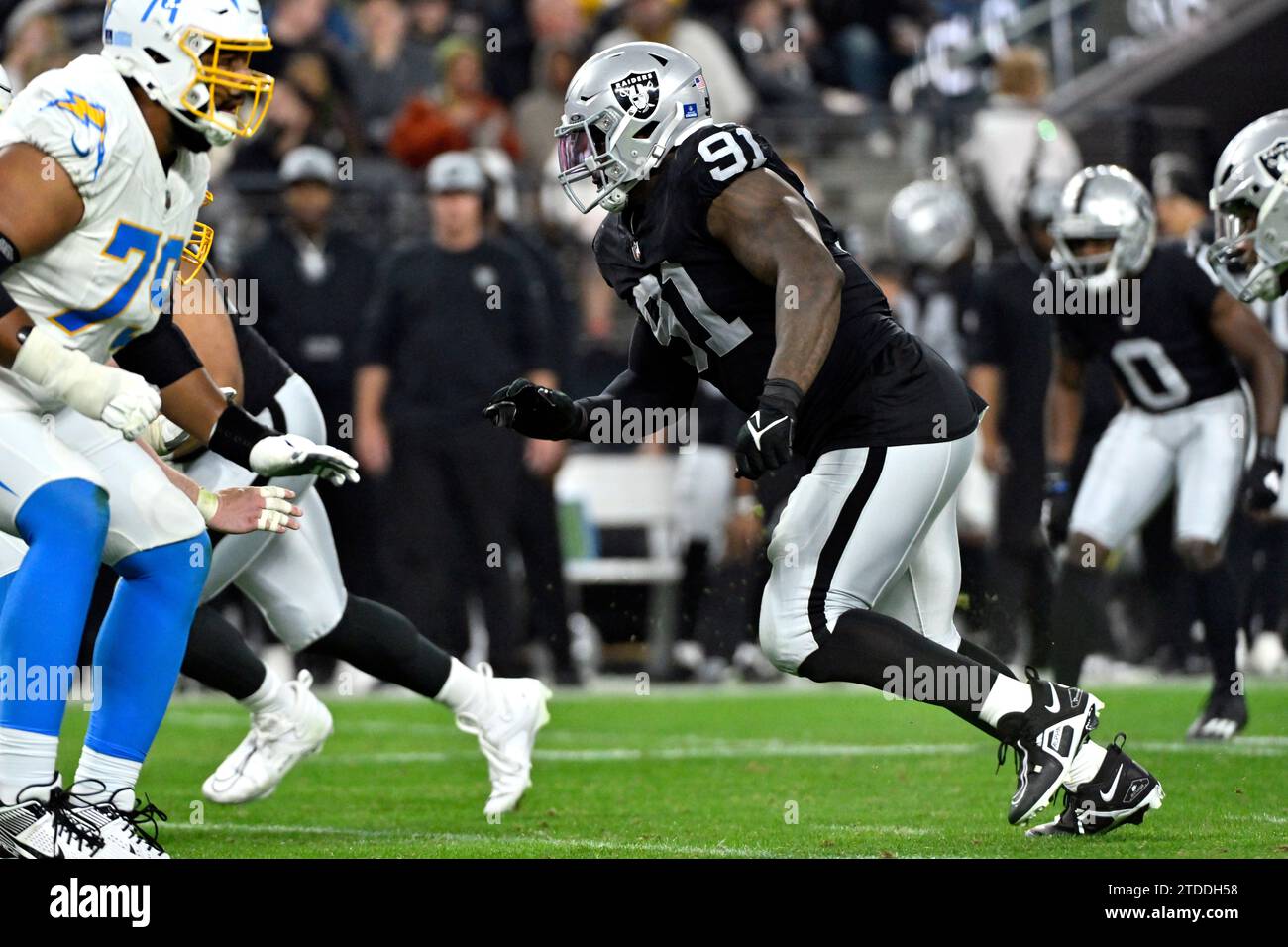 Las Vegas Raiders defensive tackle Bilal Nichols (91) advances on the ...
